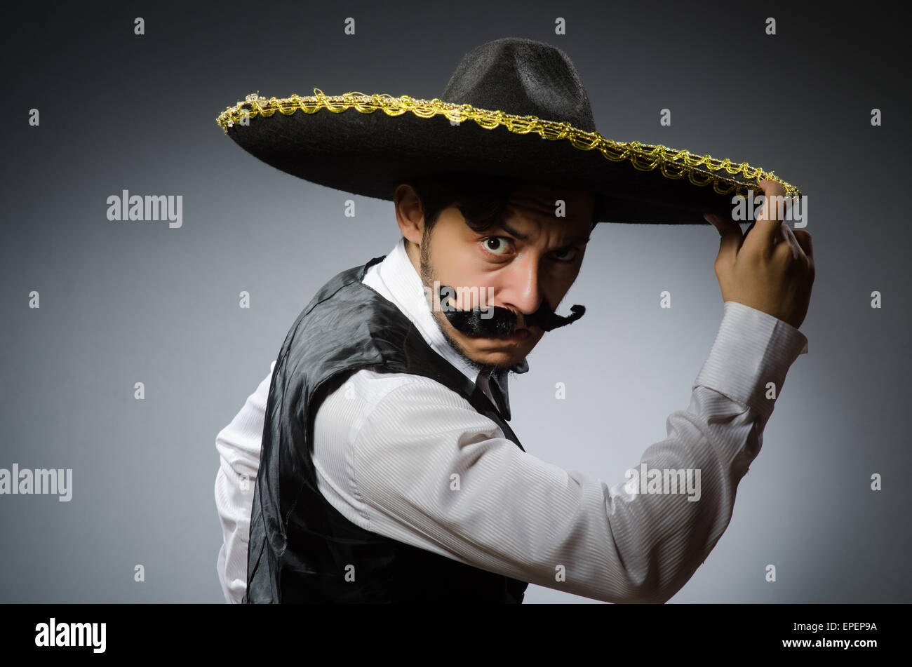 Mexican man in funny concept Stock Photo - Alamy