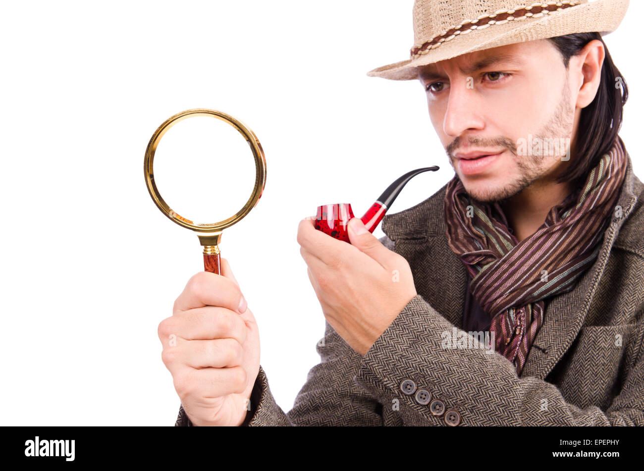 Young detective with pipe and magnifying glass Stock Photo - Alamy