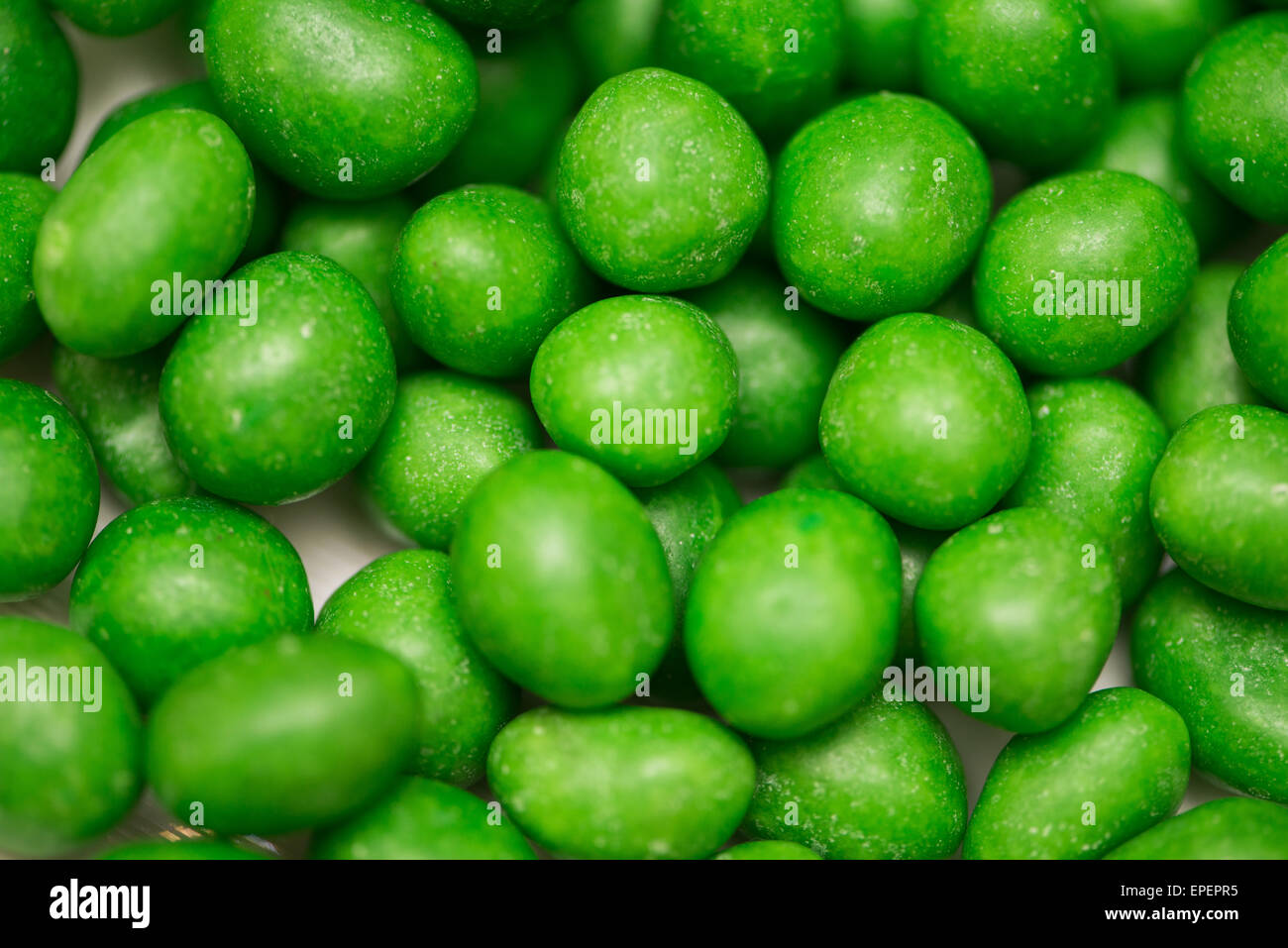 Green sweets as a background Stock Photo - Alamy