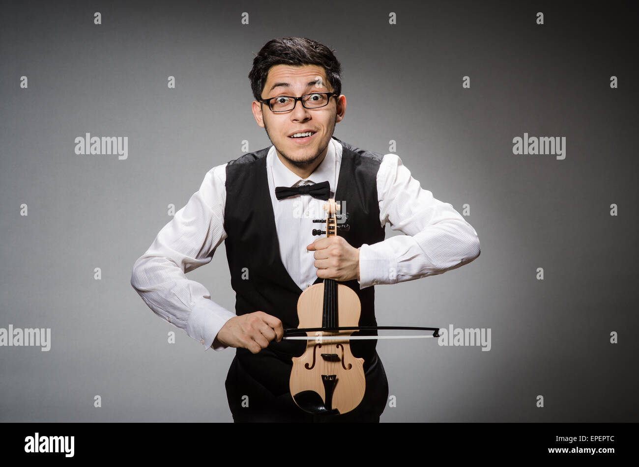 Funny violin player with fiddle Stock Photo - Alamy