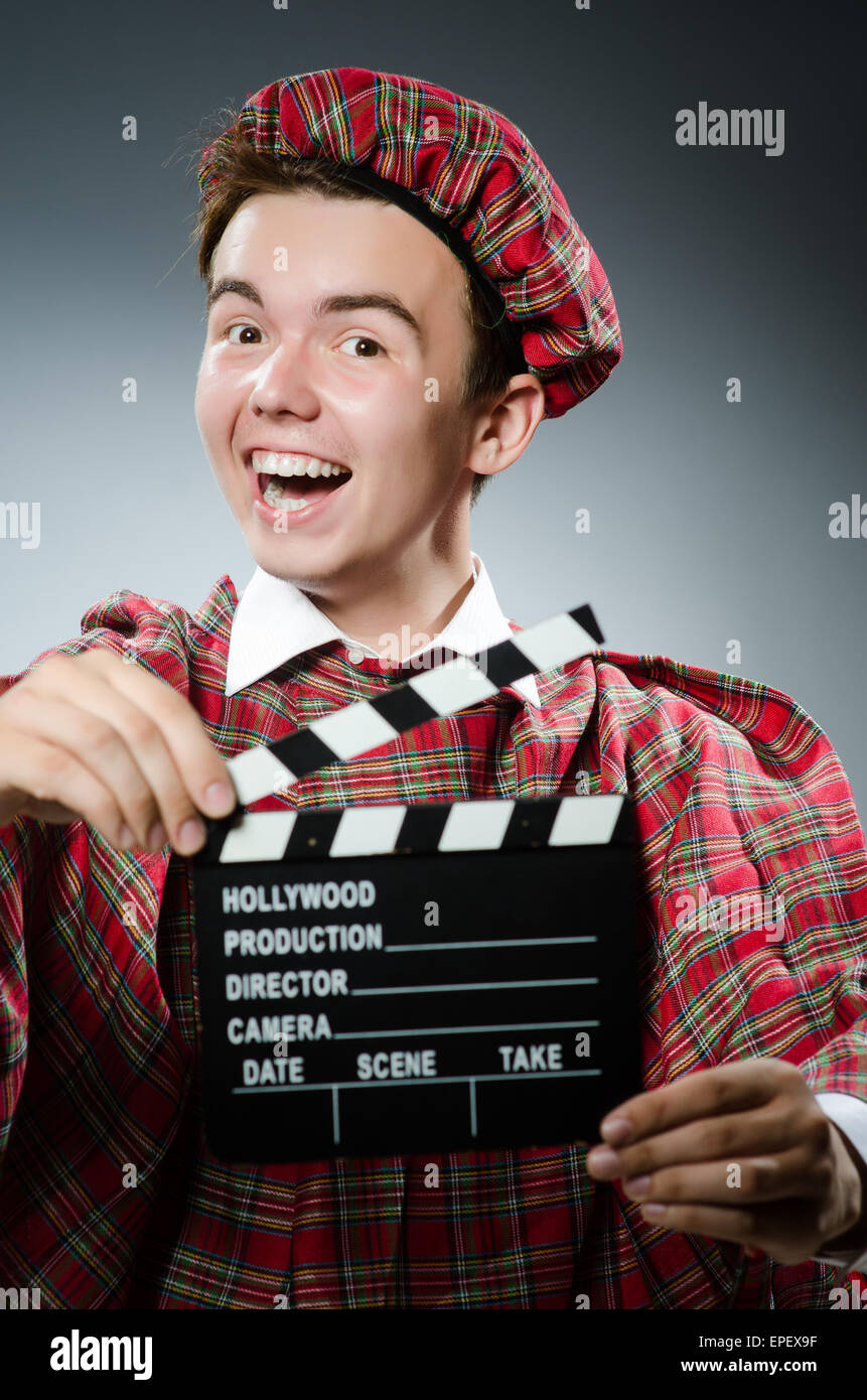 Funny scotsman with movie clapboard Stock Photo - Alamy