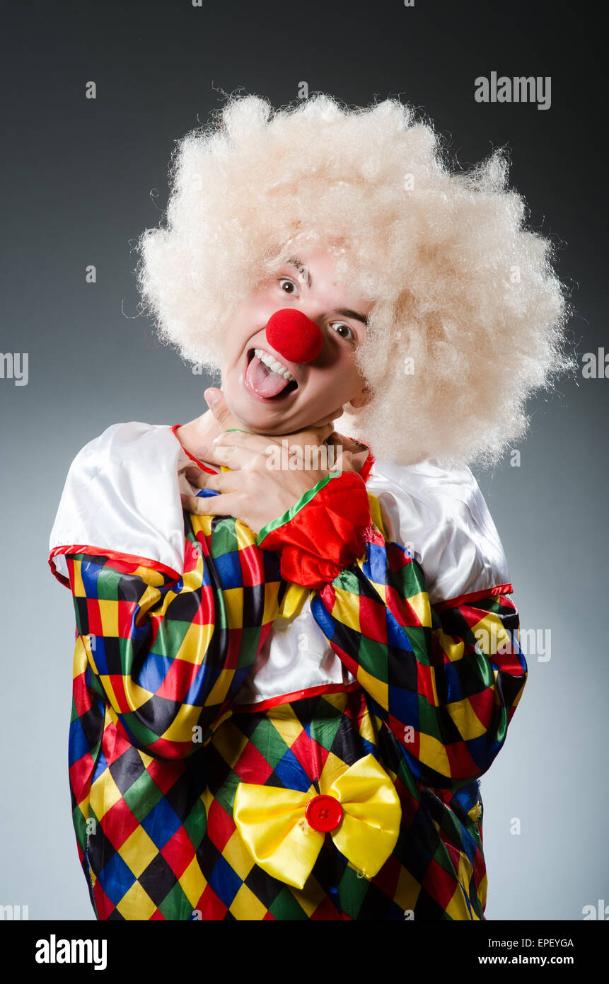 Funny clown in the studio Stock Photo - Alamy