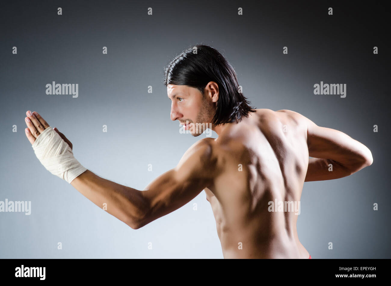 Ripped martial arts expert at training Stock Photo - Alamy