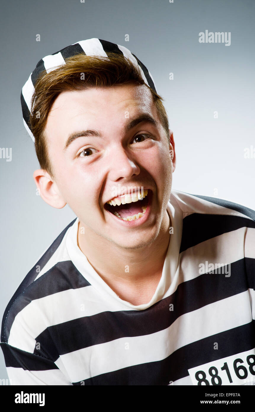 Funny prison inmate in concept Stock Photo - Alamy
