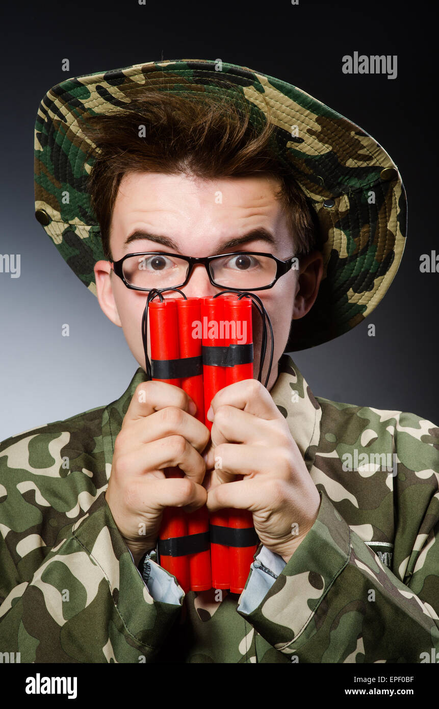 Funny soldier with red dynamite Stock Photo - Alamy