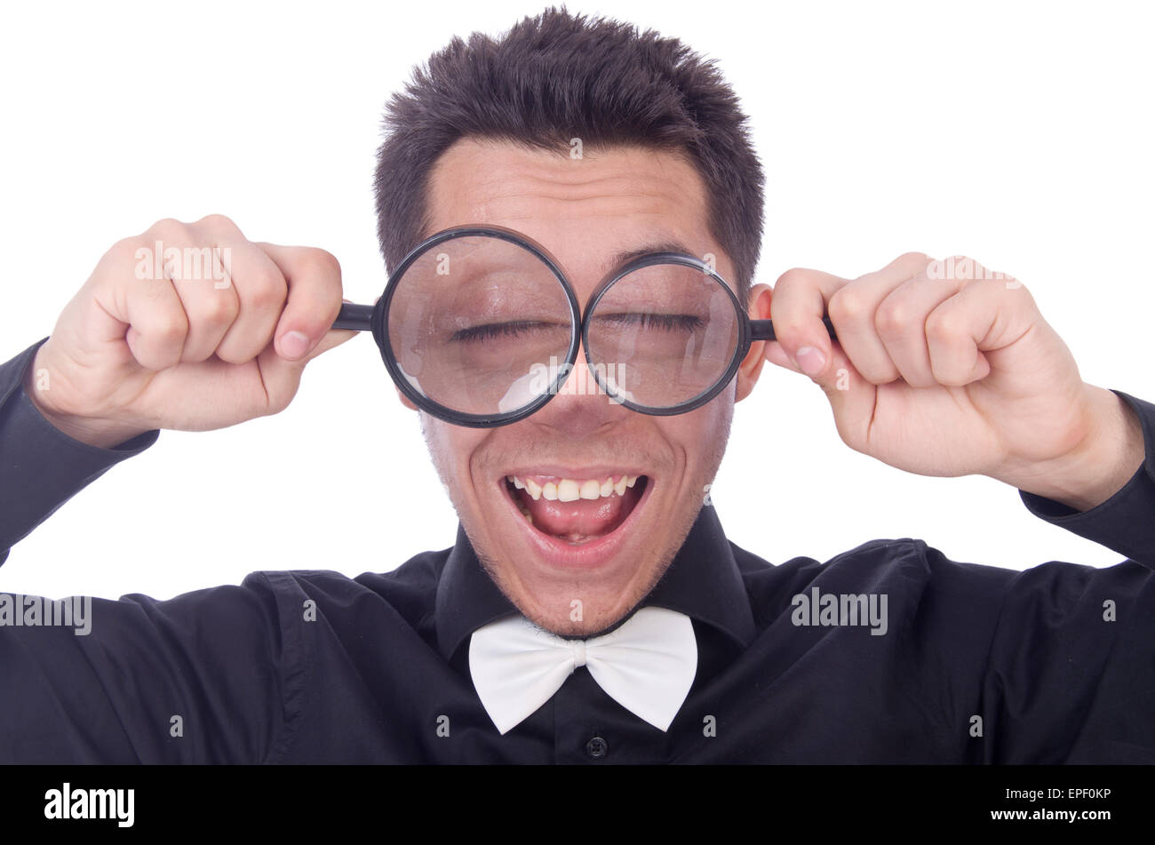 Funny man with magnifying glass Stock Photo - Alamy