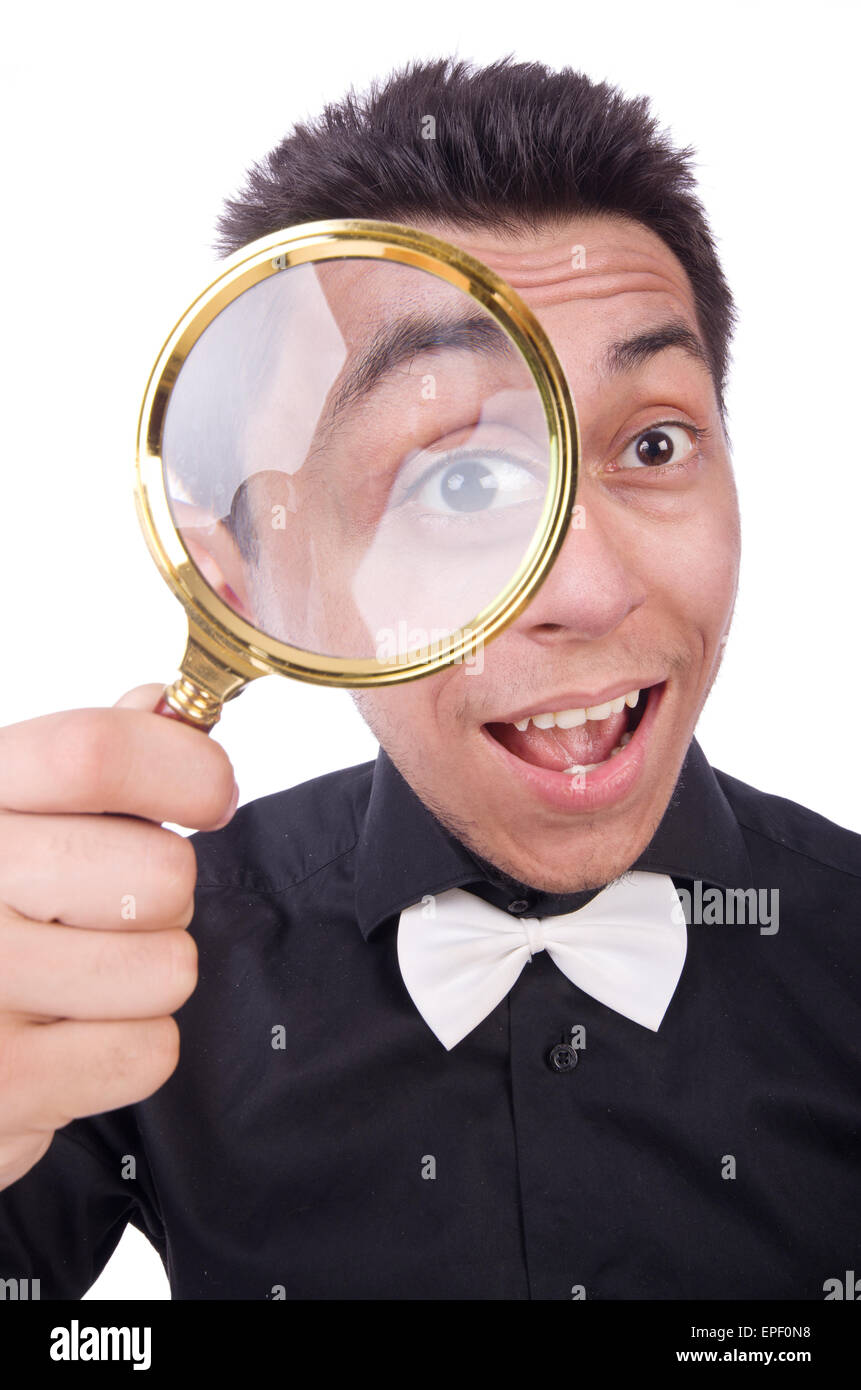 Funny man with magnifying glass Stock Photo - Alamy