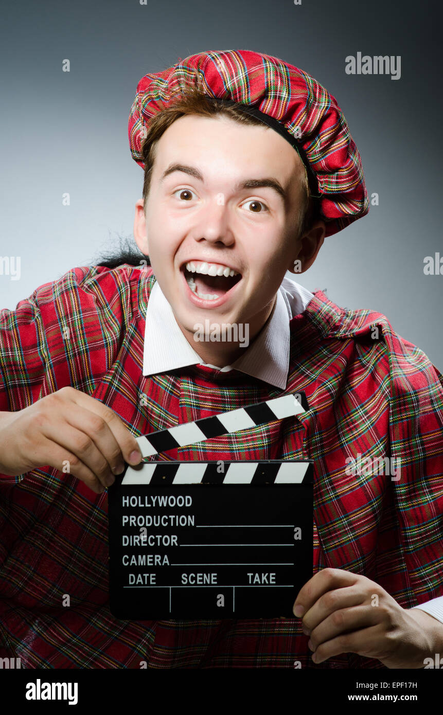 Funny scotsman with movie clapboard Stock Photo - Alamy