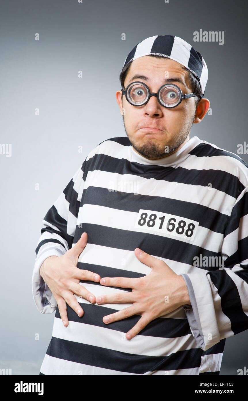 Funny prison inmate in concept Stock Photo - Alamy