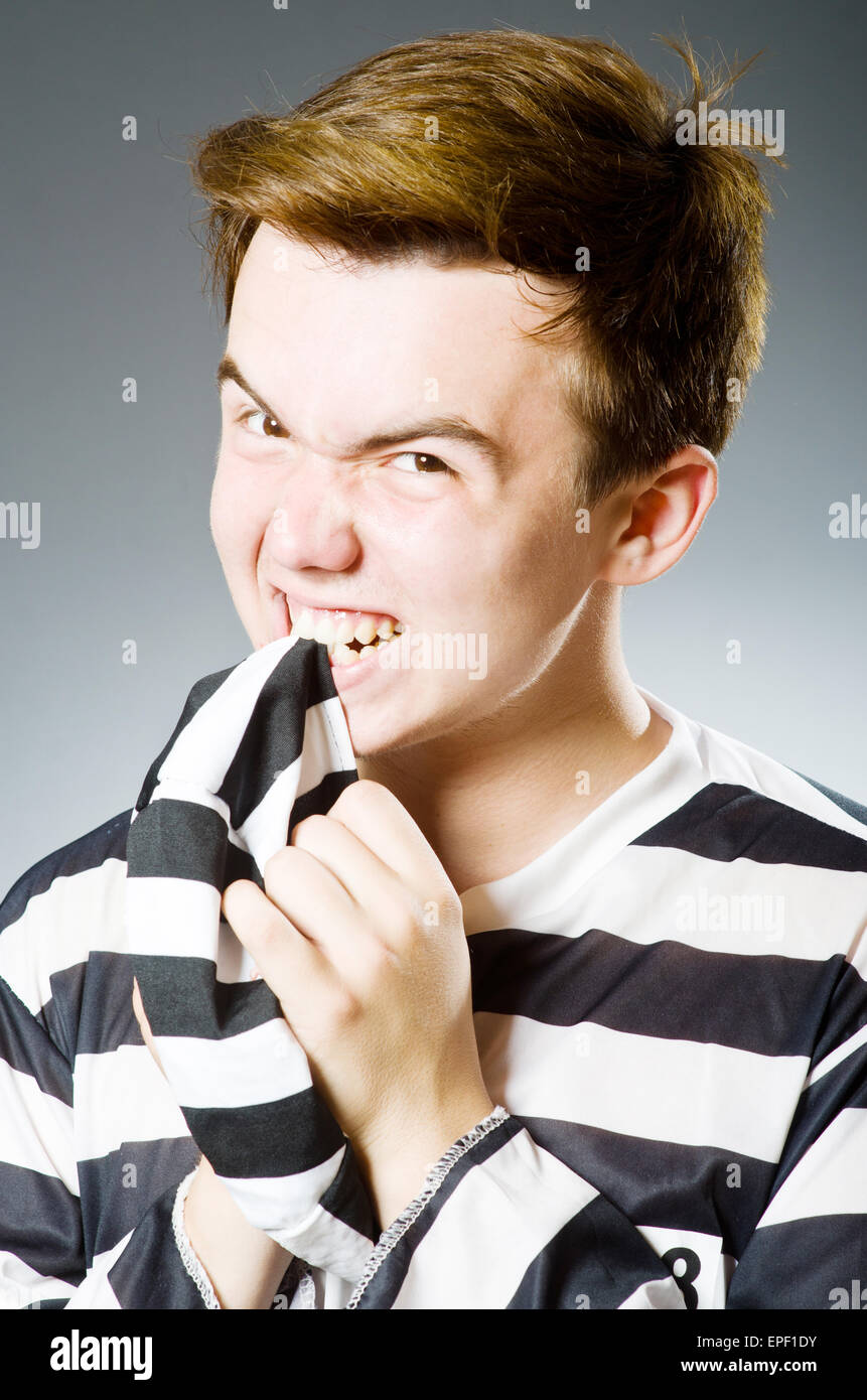 Funny prison inmate in concept Stock Photo - Alamy