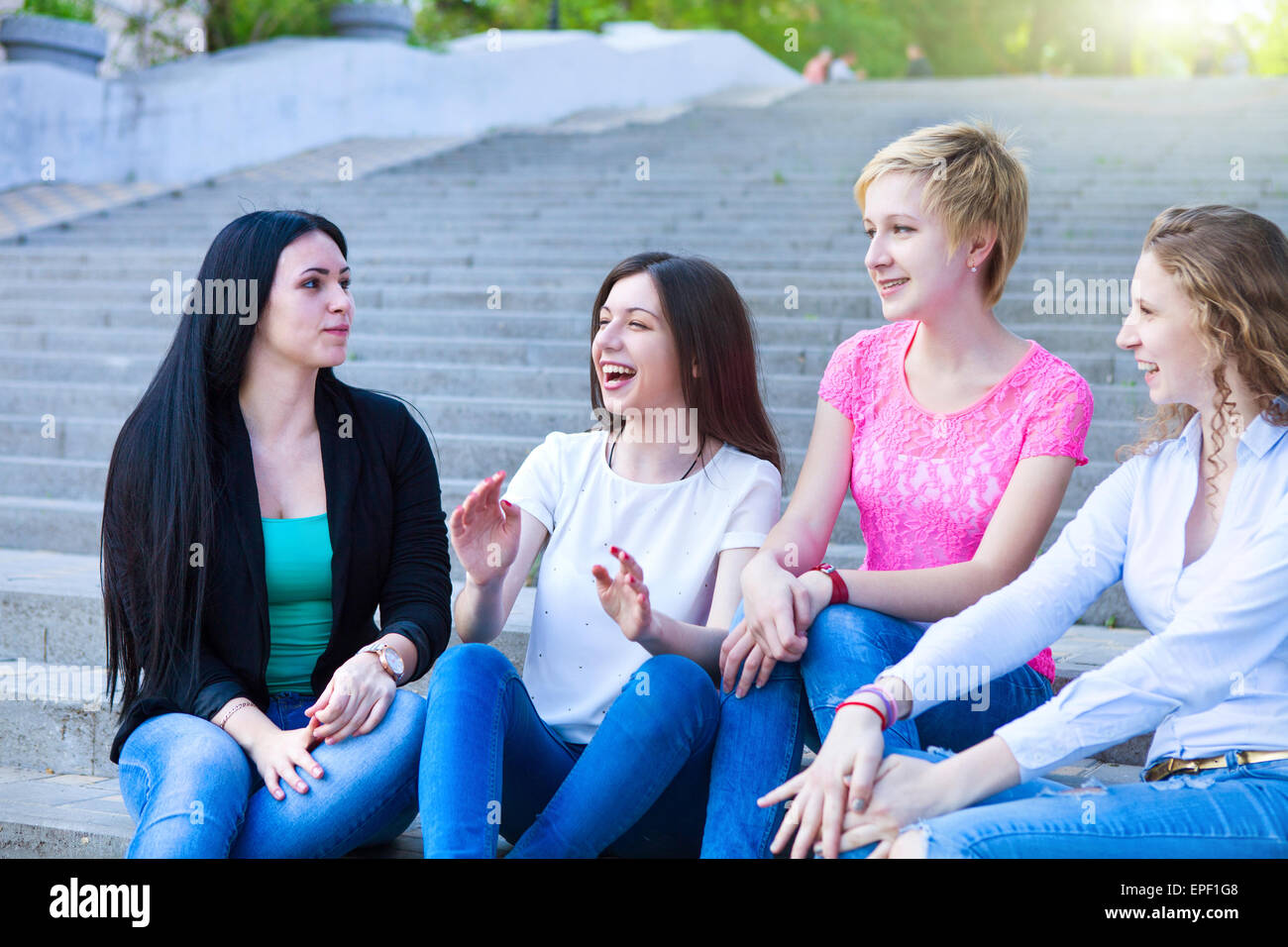 Four friends young girls Stock Photo - Alamy