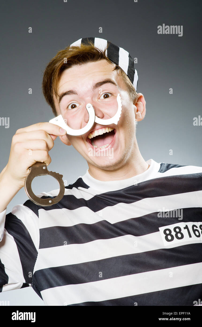 Funny prison inmate in concept Stock Photo - Alamy