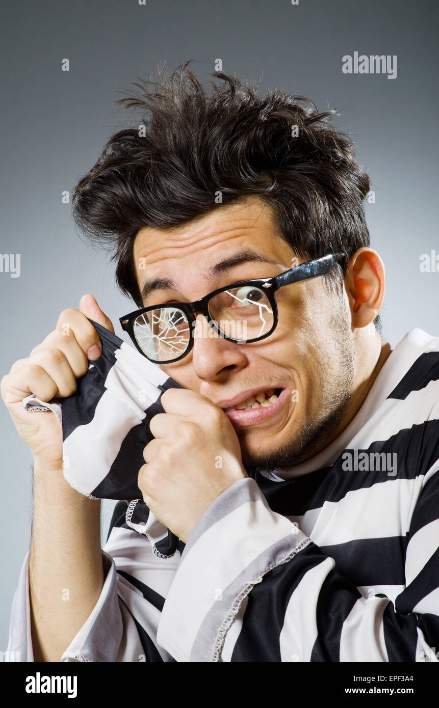 Funny prison inmate in concept Stock Photo - Alamy