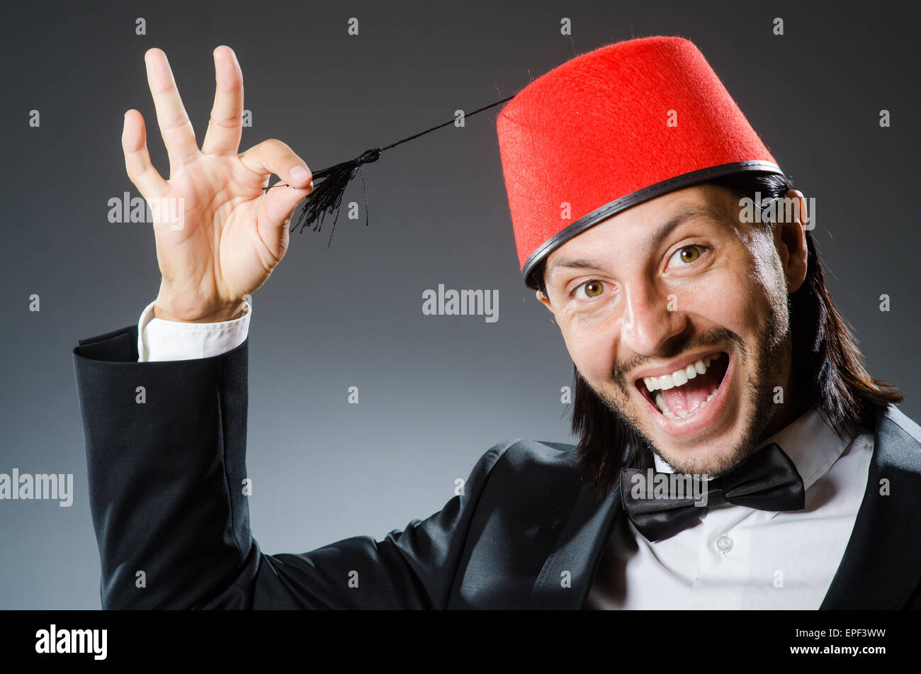 Man in traditional turkish hat and dress Stock Photo - Alamy