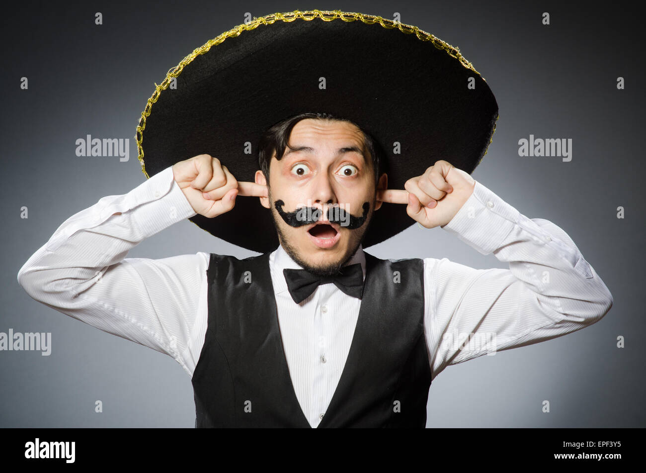 Mexican man in funny concept Stock Photo - Alamy