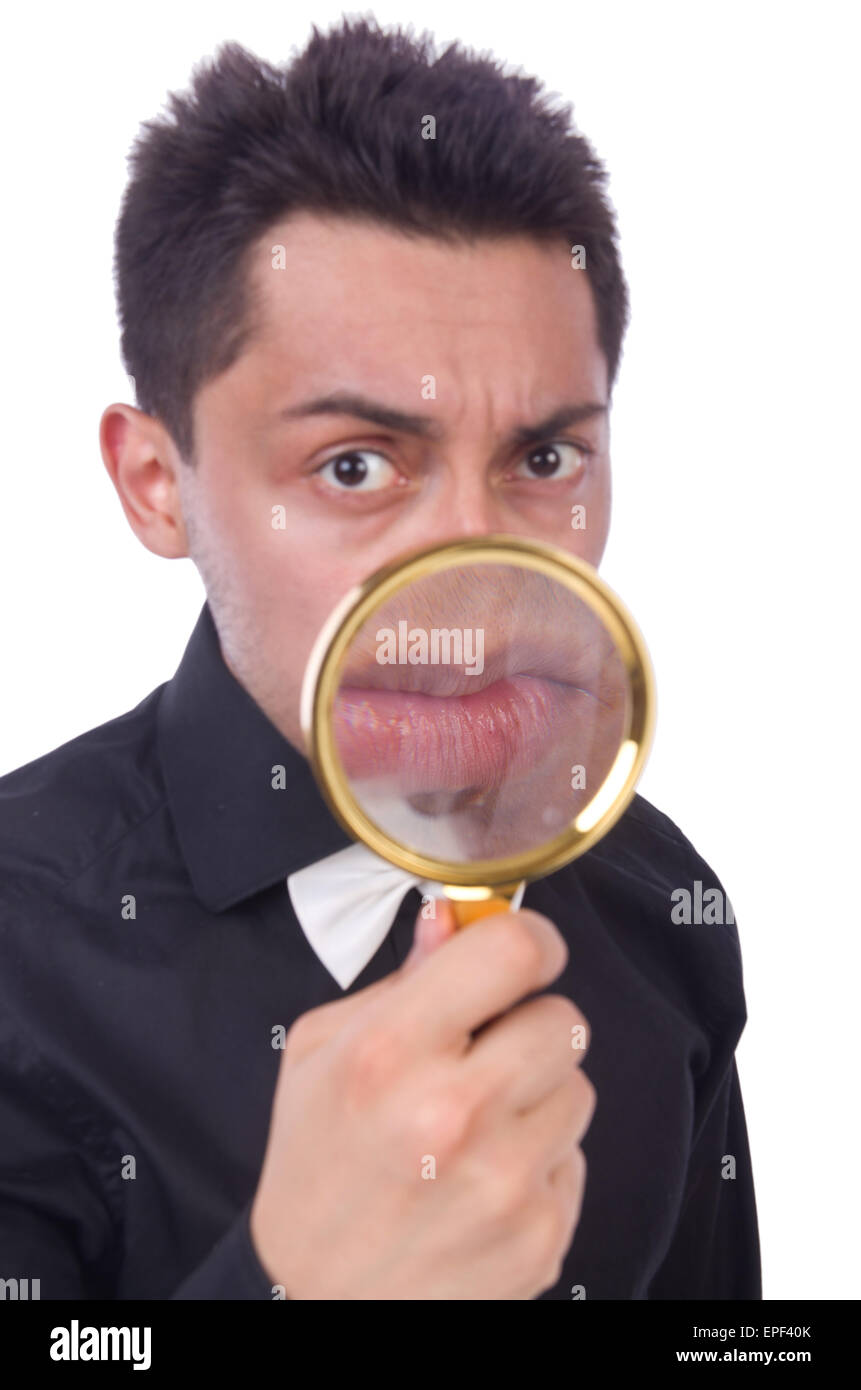 Funny man with magnifying glass Stock Photo - Alamy