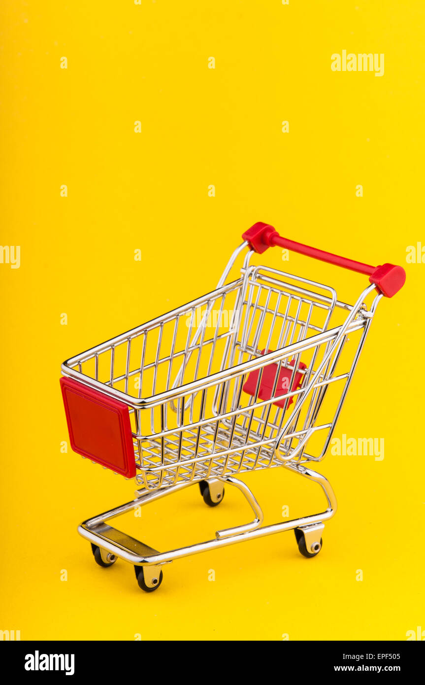 Shopping cart on seamless background Stock Photo - Alamy