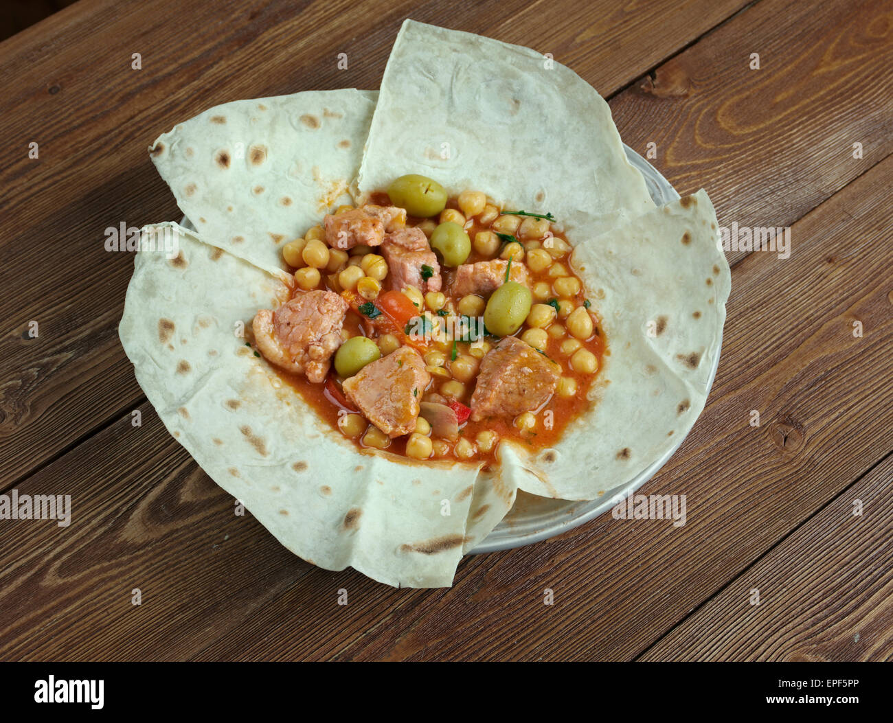 Tharid - traditional Arab dish made of pieces of bread in vegetable or ...