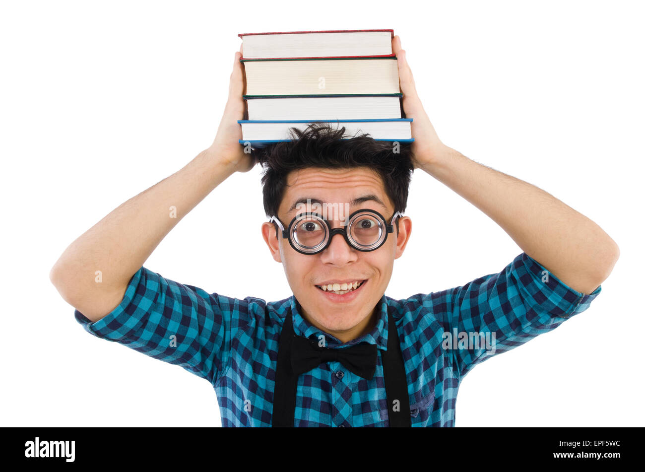 Funny student with stack of books Stock Photo - Alamy