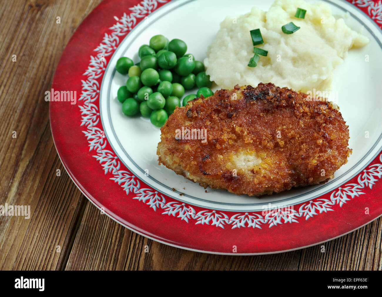 Kotlet schabowy - Polish variety of pork breaded cutlet coated with ...