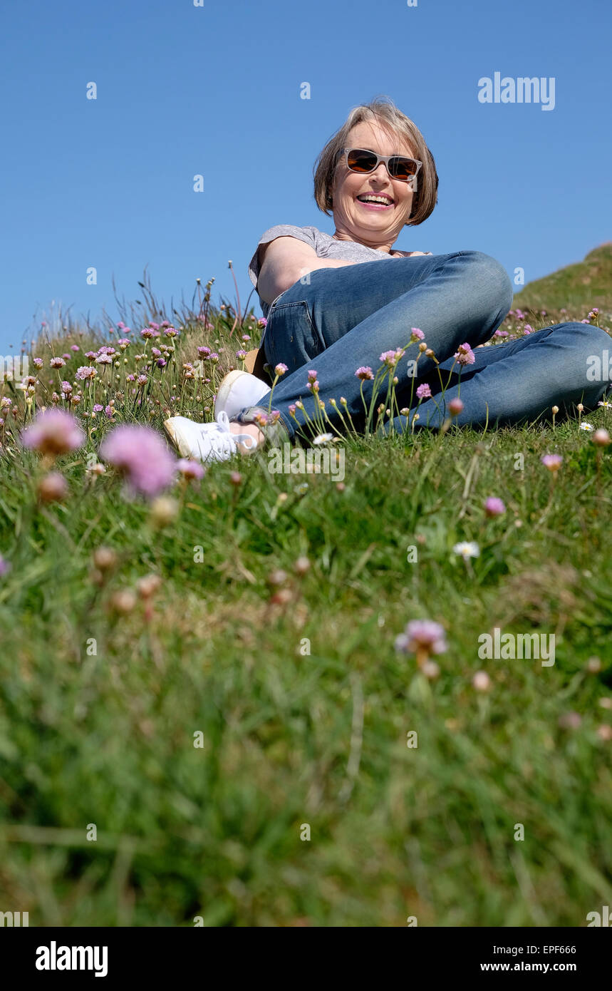 Happy lady grass hi-res stock photography and images - Alamy
