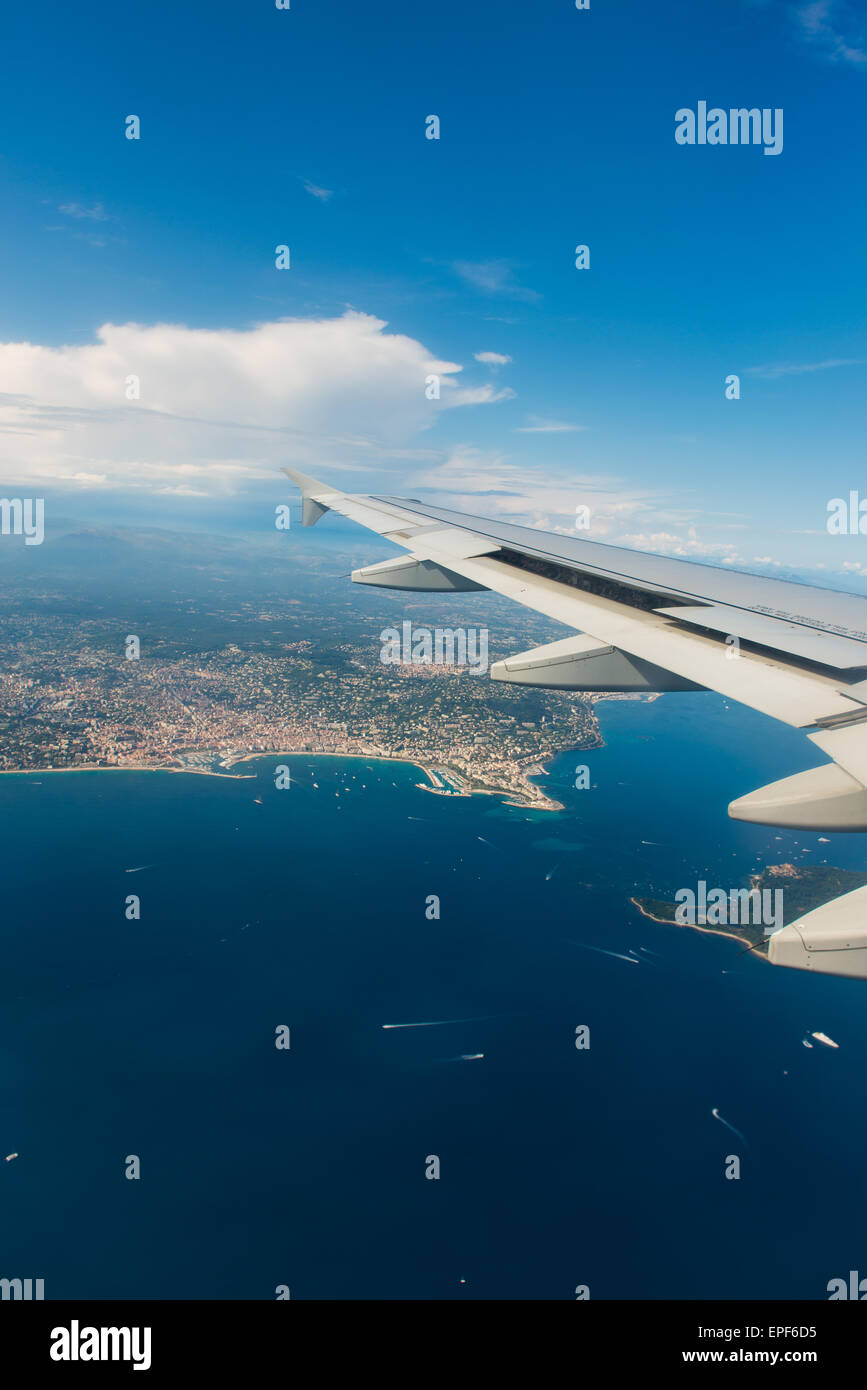 Airplane wing out of window Stock Photo - Alamy