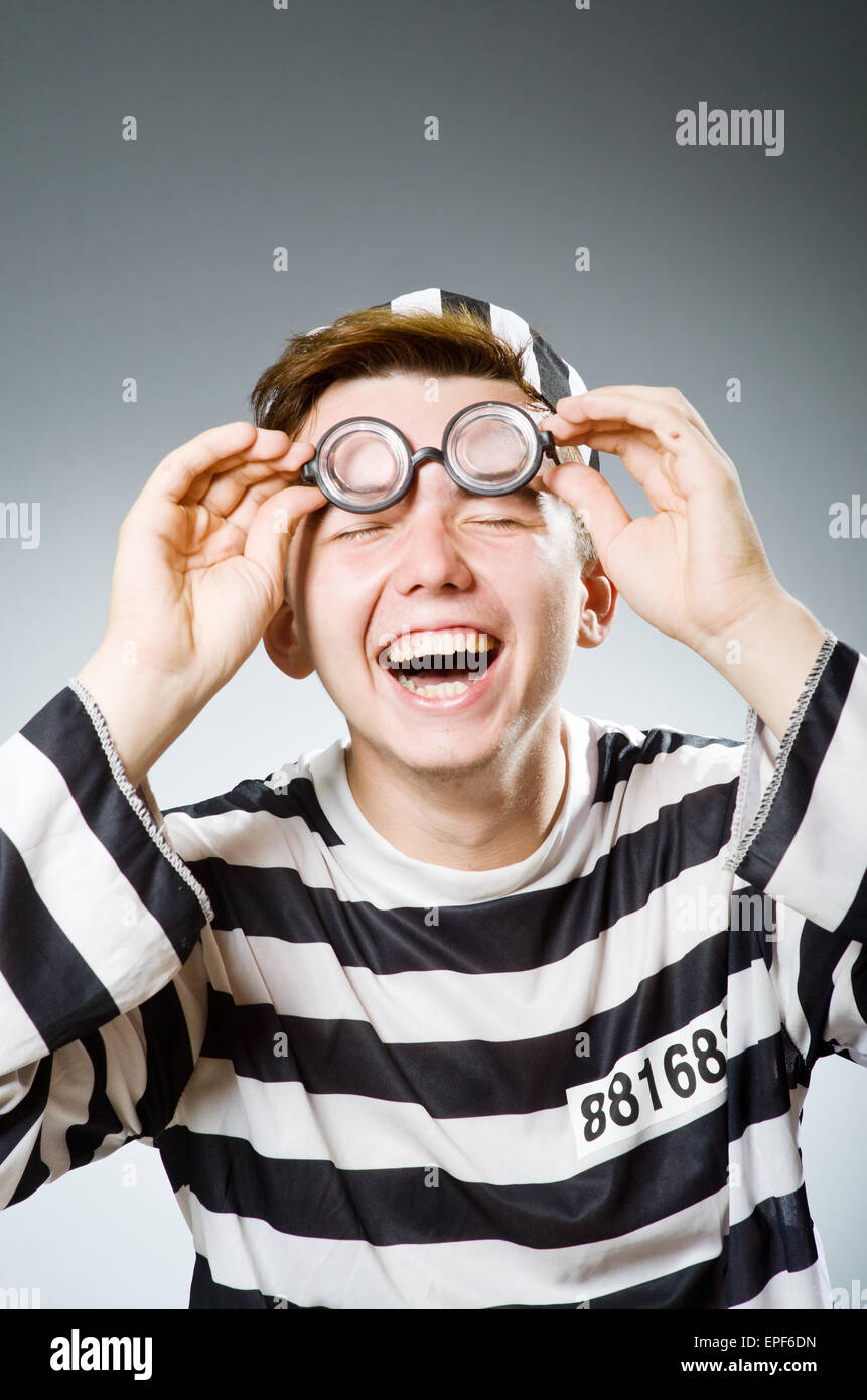 Funny prison inmate in concept Stock Photo - Alamy