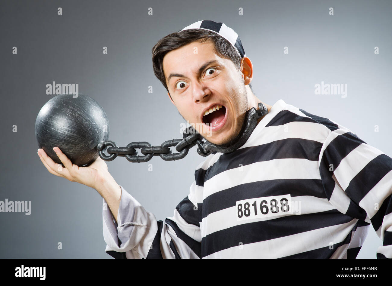 Funny prison inmate in concept Stock Photo - Alamy