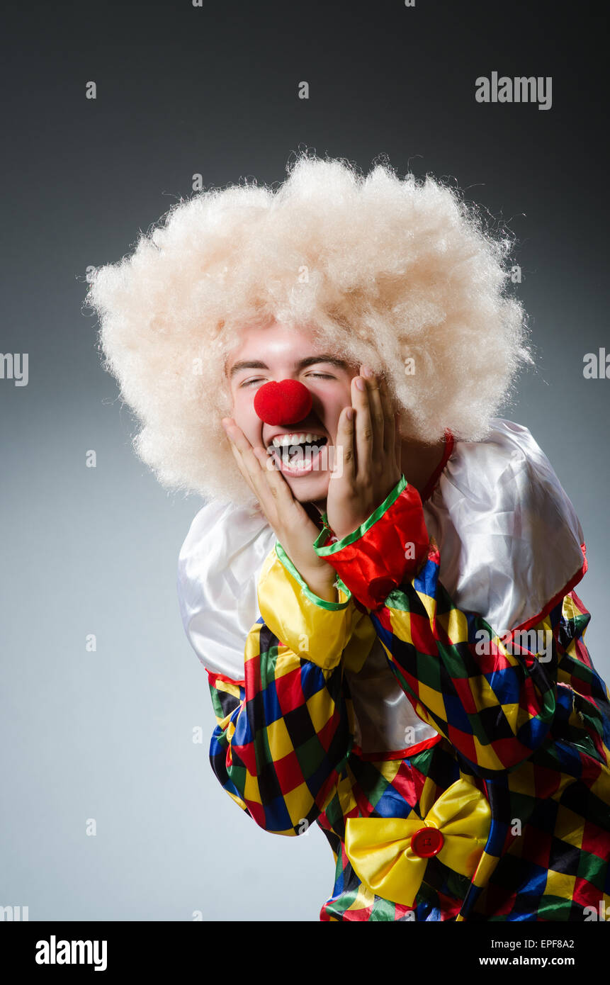 Funny clown in the studio Stock Photo - Alamy