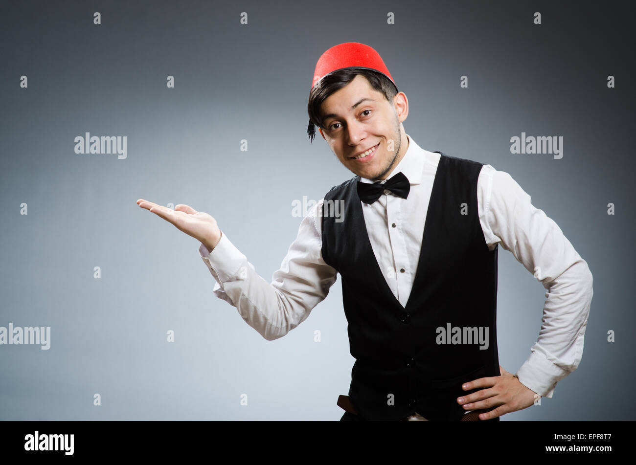 Man wearing traditional turkish hat fez Stock Photo - Alamy