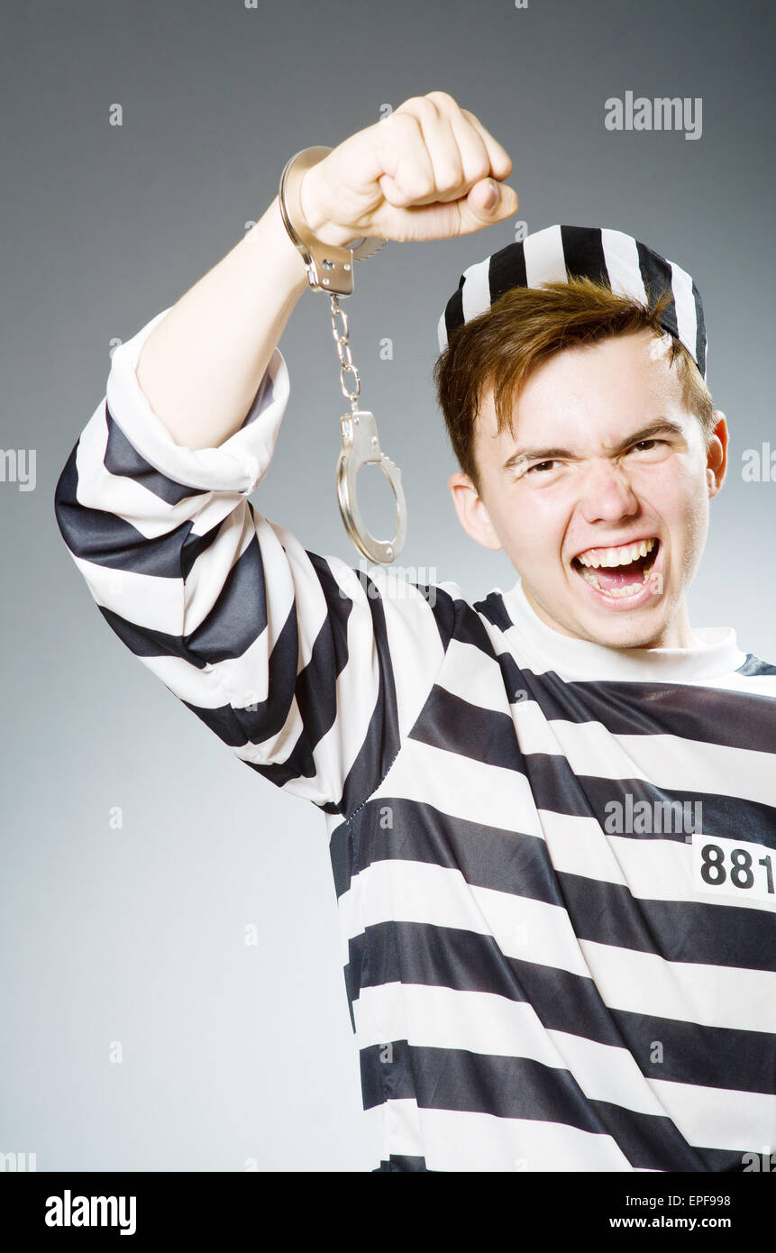 Funny prison inmate in concept Stock Photo - Alamy
