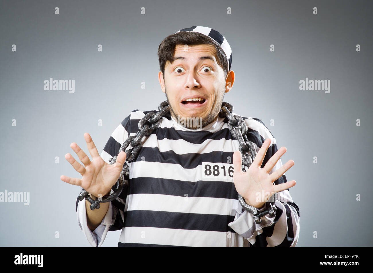 Funny prison inmate in concept Stock Photo - Alamy