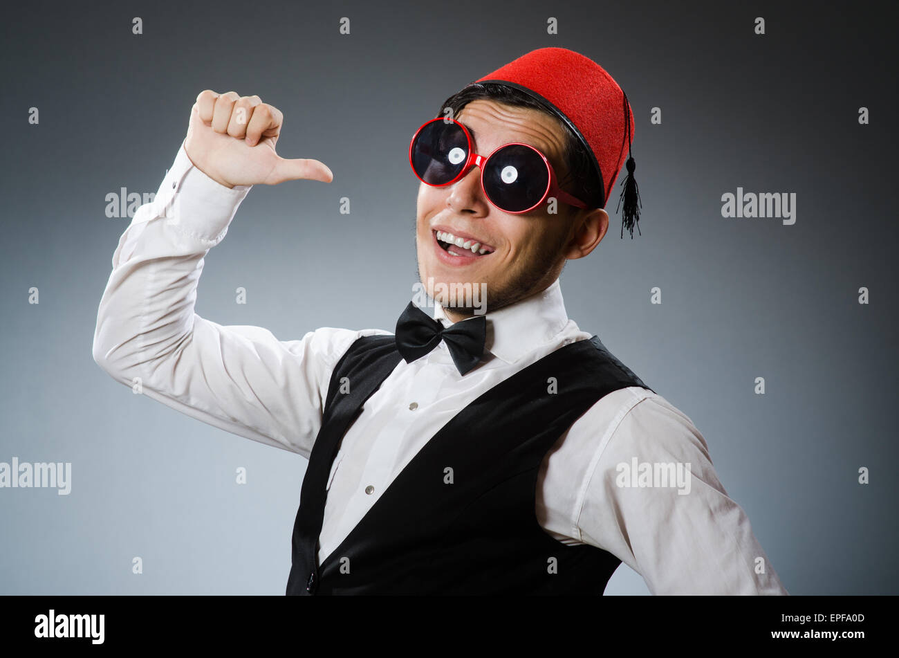 Man wearing traditional turkish hat fez Stock Photo - Alamy