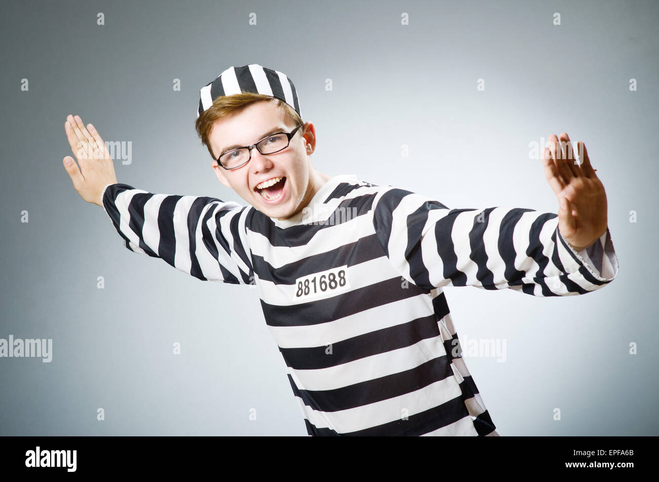 Funny prison inmate in concept Stock Photo - Alamy