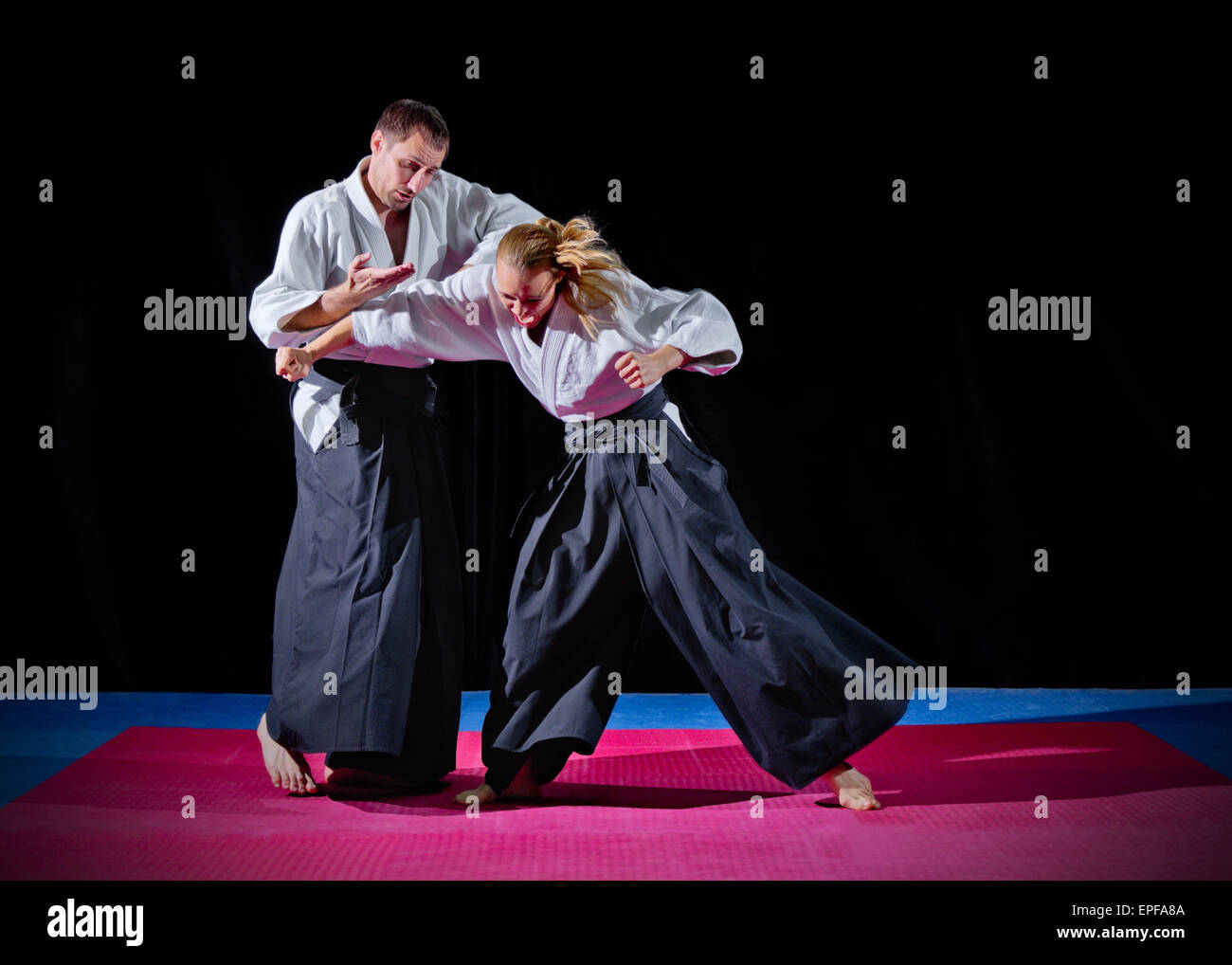 Man woman fighting aikido training hi-res stock photography and images ...