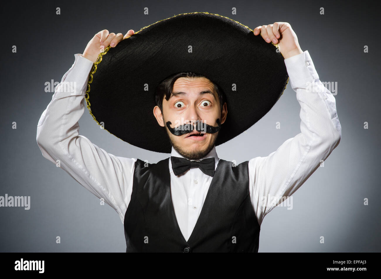Mexican man in funny concept Stock Photo - Alamy