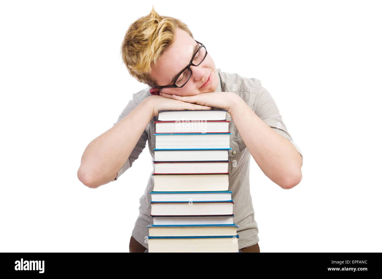 Funny student with stack of books Stock Photo - Alamy
