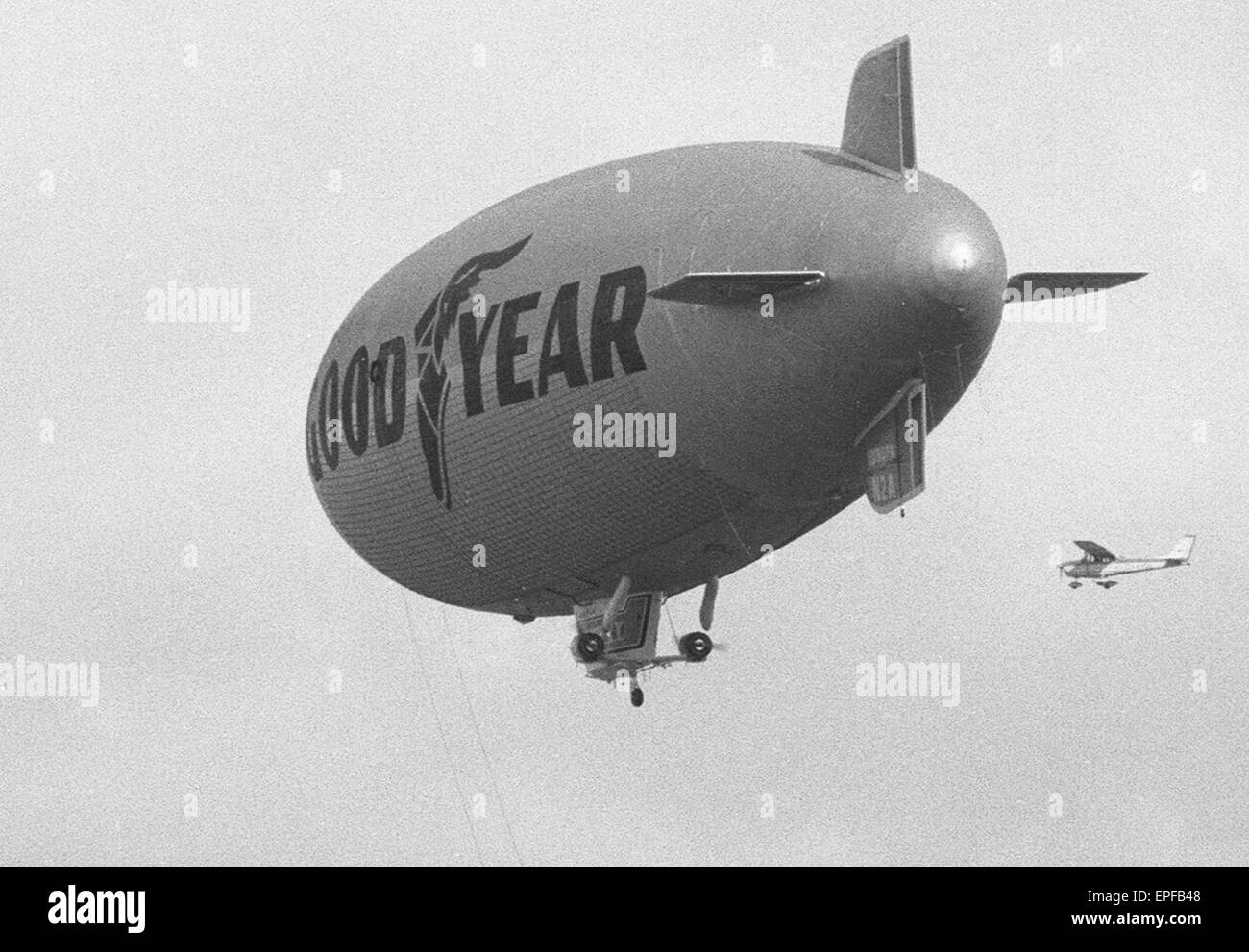 The Goodyear airship Europa seen escorted by a Cessna 172 light ...