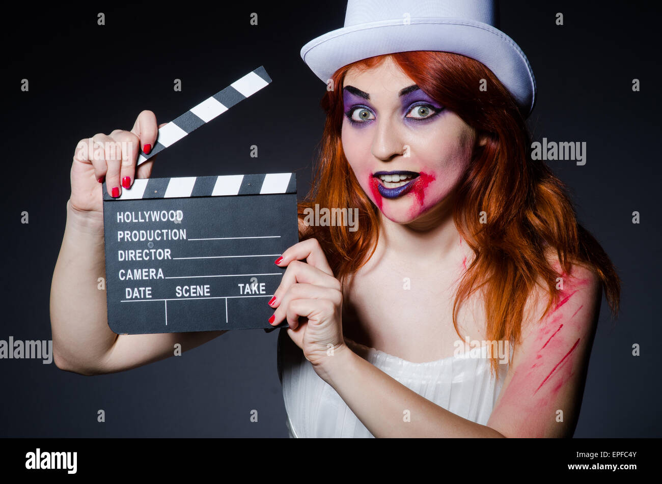 Satan halloween concept with movie clapper board Stock Photo - Alamy