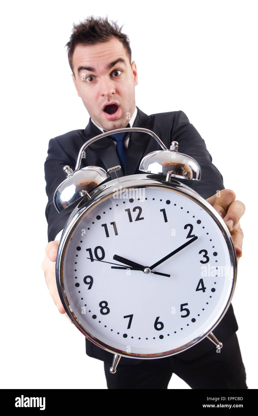 Man with alarm clock isolated on white Stock Photo - Alamy