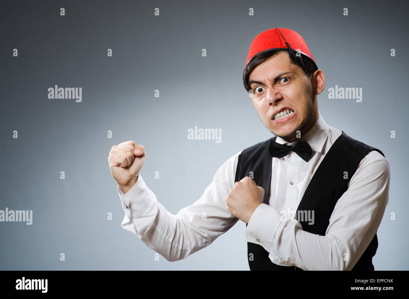 Man wearing traditional turkish hat fez Stock Photo - Alamy
