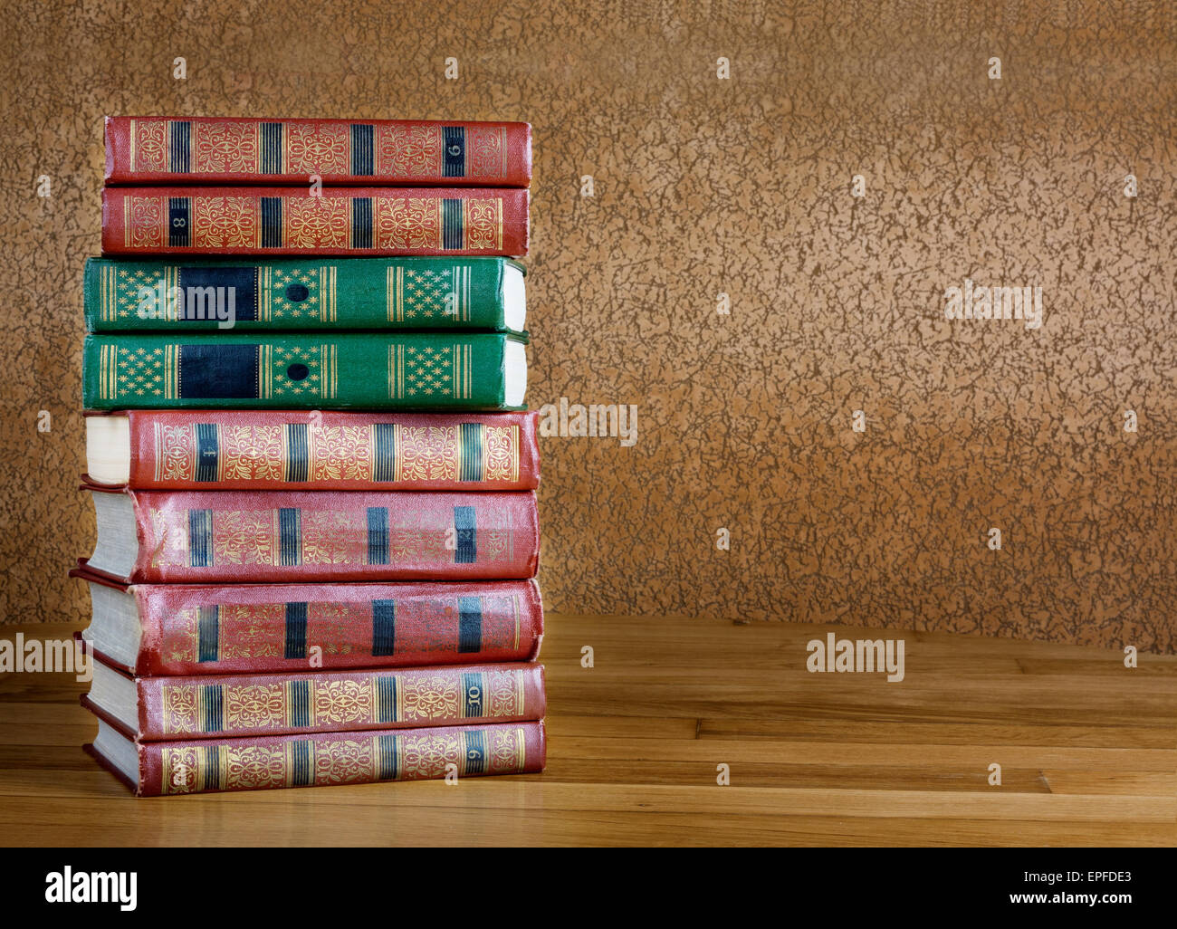 Pile of old books on a beautiful wooden table Stock Photo - Alamy