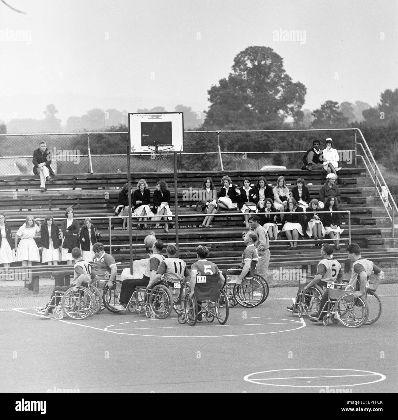 Paralympic Athletes training at Stoke Mandeville, watched by patients ...