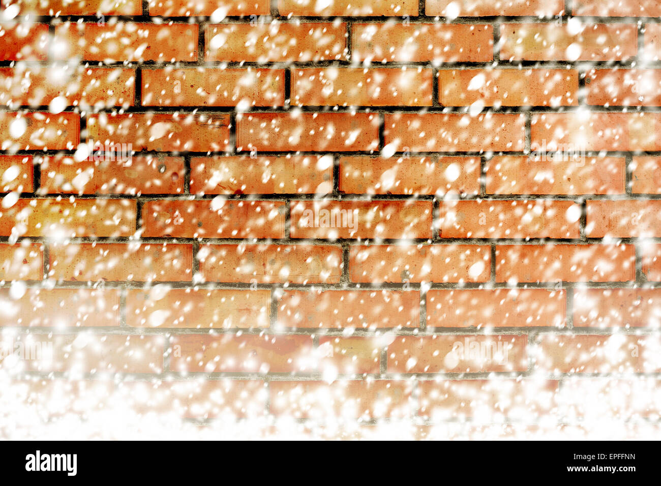Texture of red brick wall with white snow flakes Stock Photo - Alamy