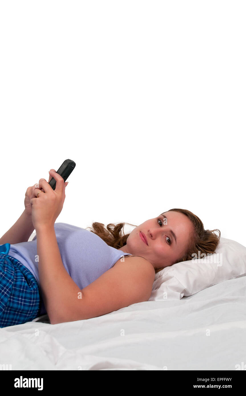 Woman Texting in Bed Stock Photo - Alamy