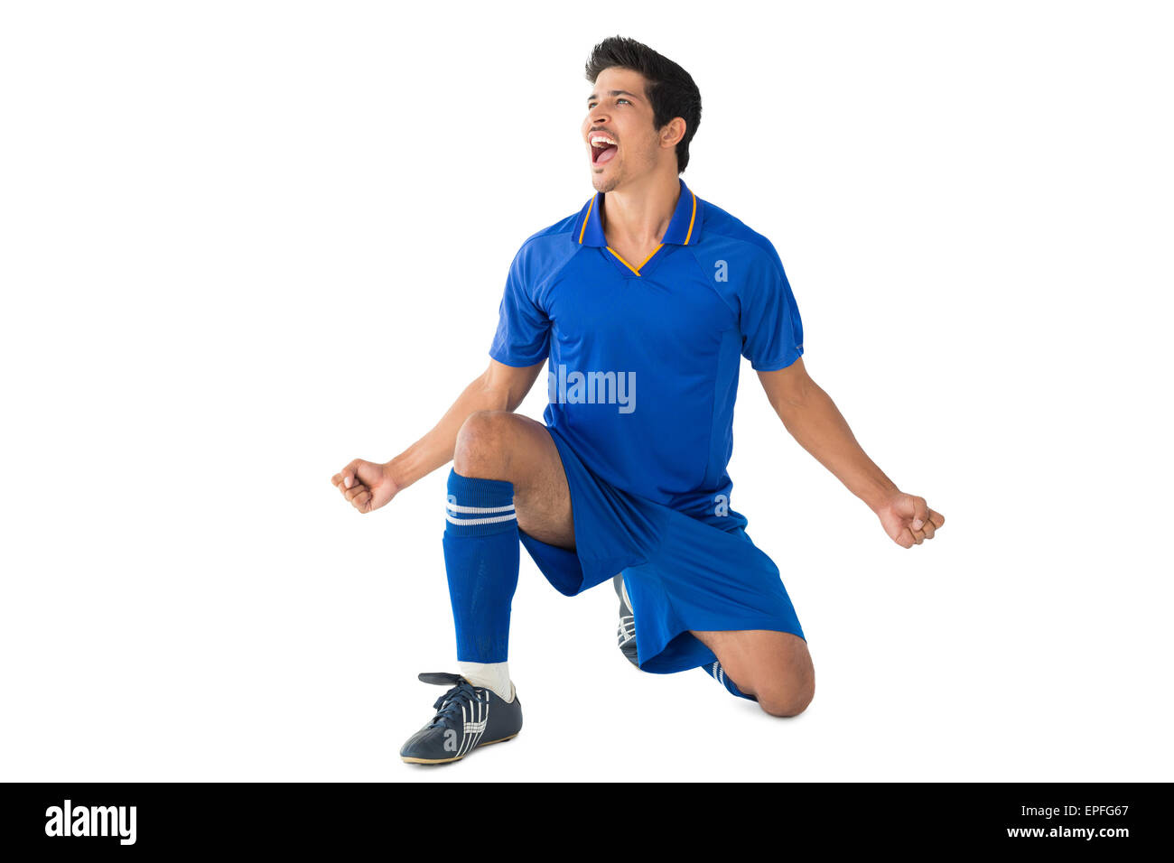 Athletic football player cheering Stock Photo - Alamy