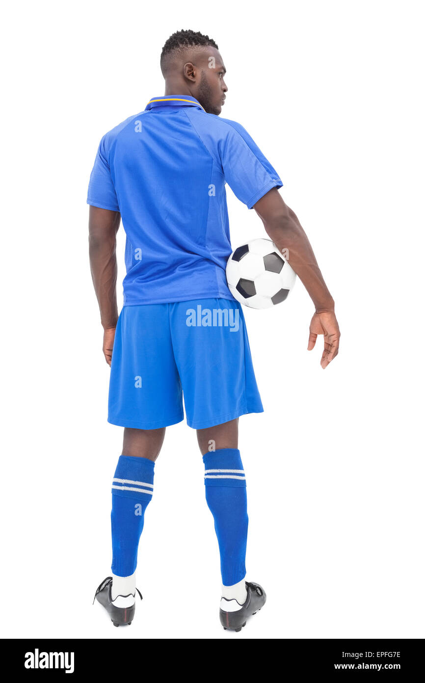 Rear view of a serious football player Stock Photo - Alamy