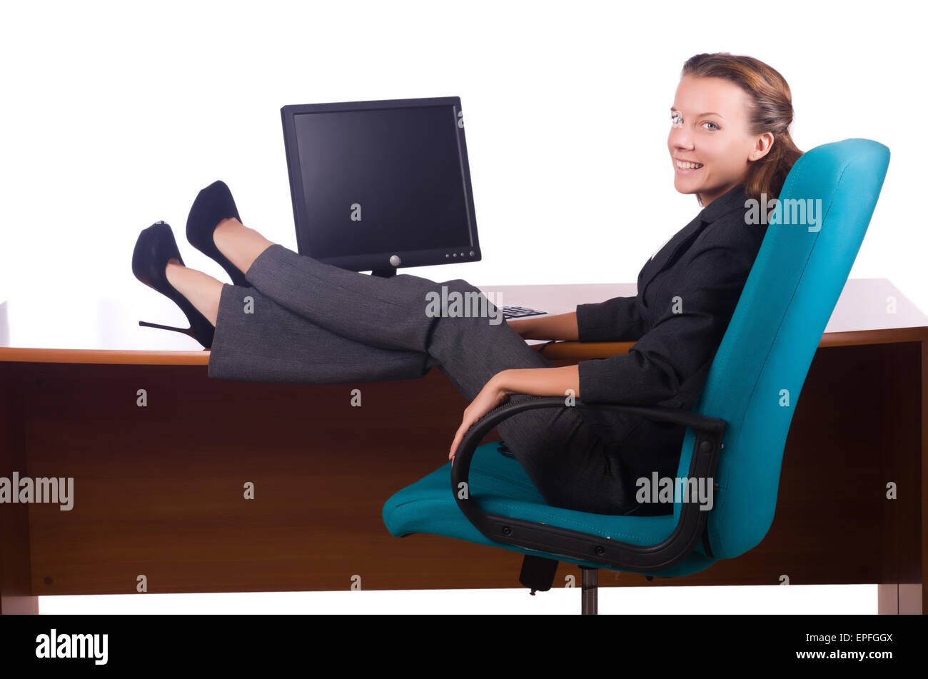 Happy with man sitting at the desk with computer Stock Photo - Alamy