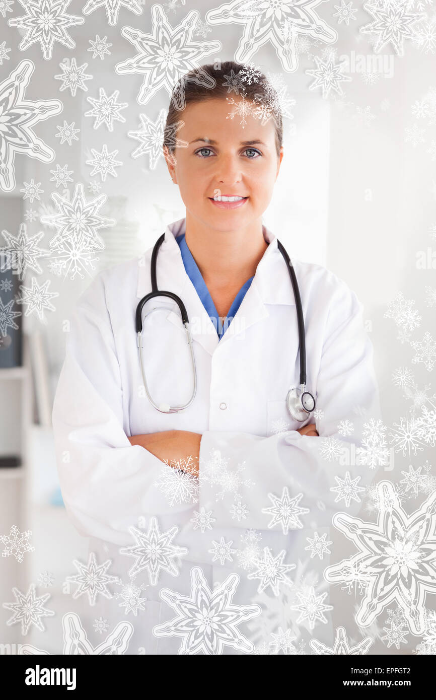 Good looking doctor looking into the camera Stock Photo - Alamy