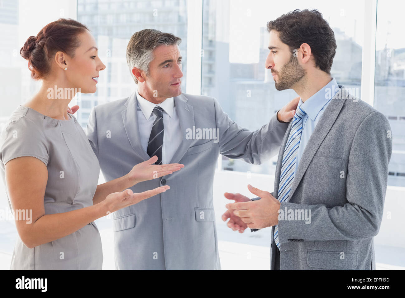 Businesswoman arguing with co-worker Stock Photo - Alamy